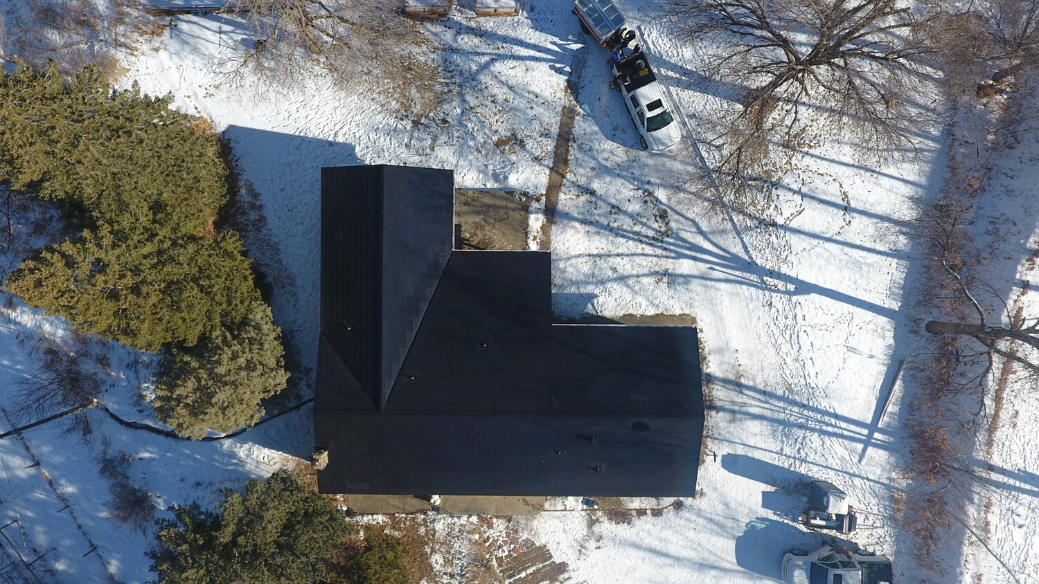 Tesla Solar Roof Installation - Advosy Roofing and Construction